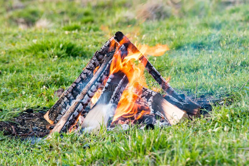 Bonfire on the Field in the Light of the Setting Sun Stock Image ...