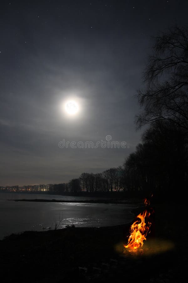 Bonfire Flame and Moon Over Lake Stock Image - Image of bonfire ...