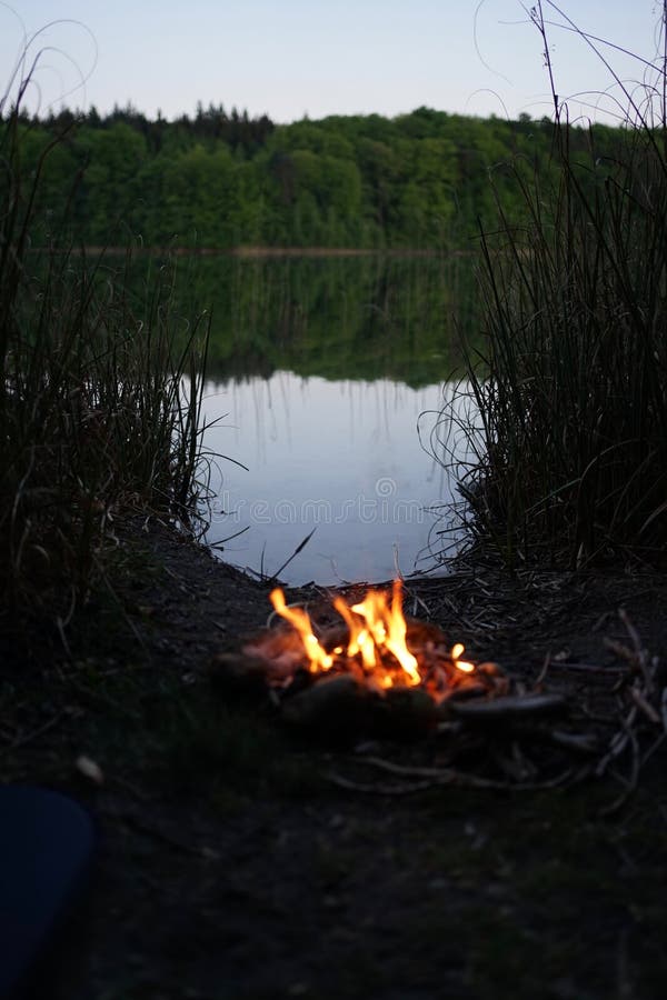Bonfire by Lake of the Prairies, Manitoba Stock Photo - Image of ...