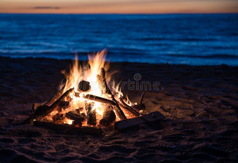 Bonfire by the Lake at Sunset Stock Image - Image of evening, dusk ...
