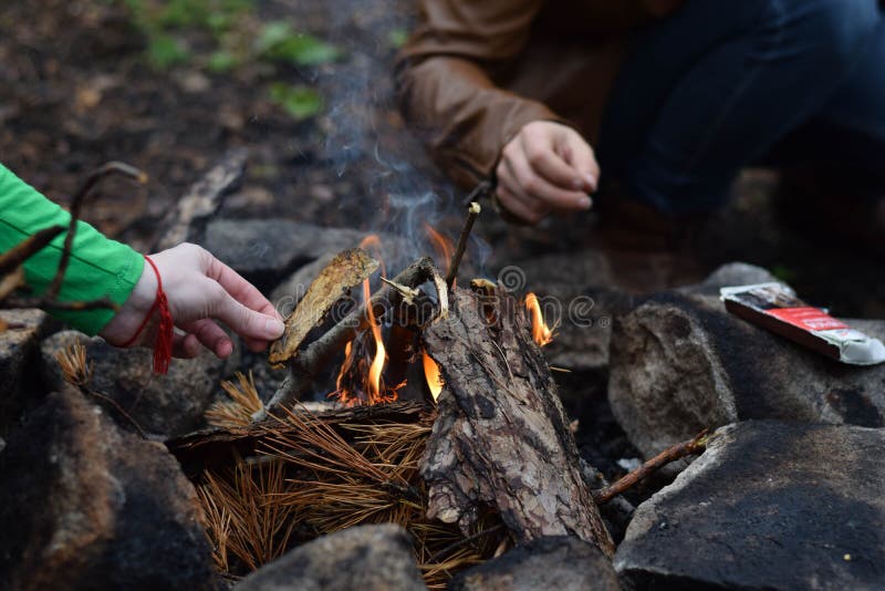 Bonfire stock photo. Image of people, rocks, bonfire - 139949646