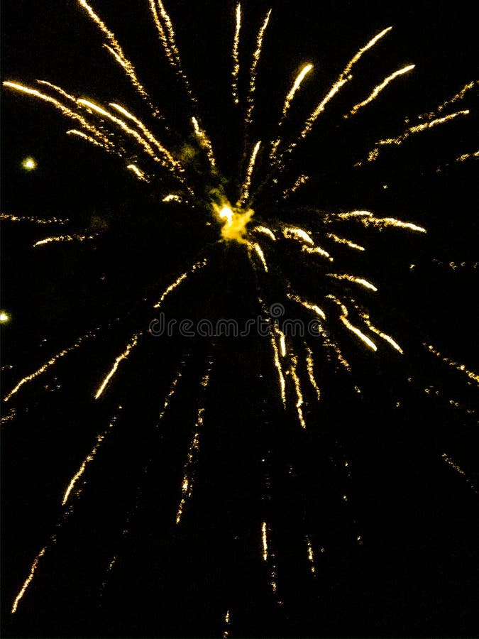 Firework Exploding into Golden Lights Stock Photo - Image of decoration ...