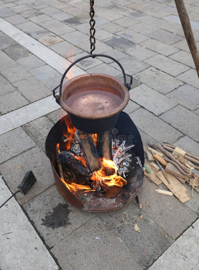 Cauldron with Boiling Water and a Large Wood Fire Stock Photo - Image ...