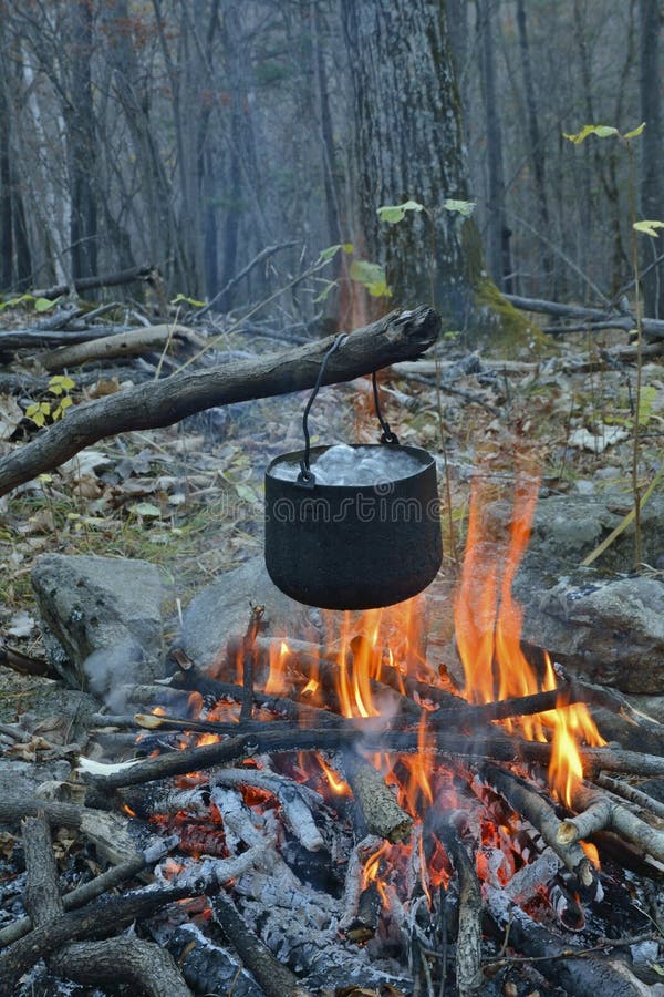 Bonfire and pot 15 stock image. Image of burn, campfire - 51273731