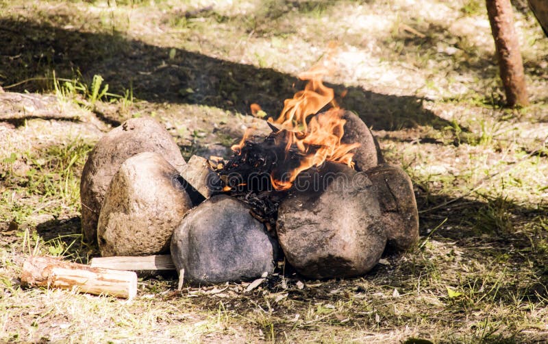Bonfire on the Rocks in the Hike Stock Photo - Image of food, fire ...