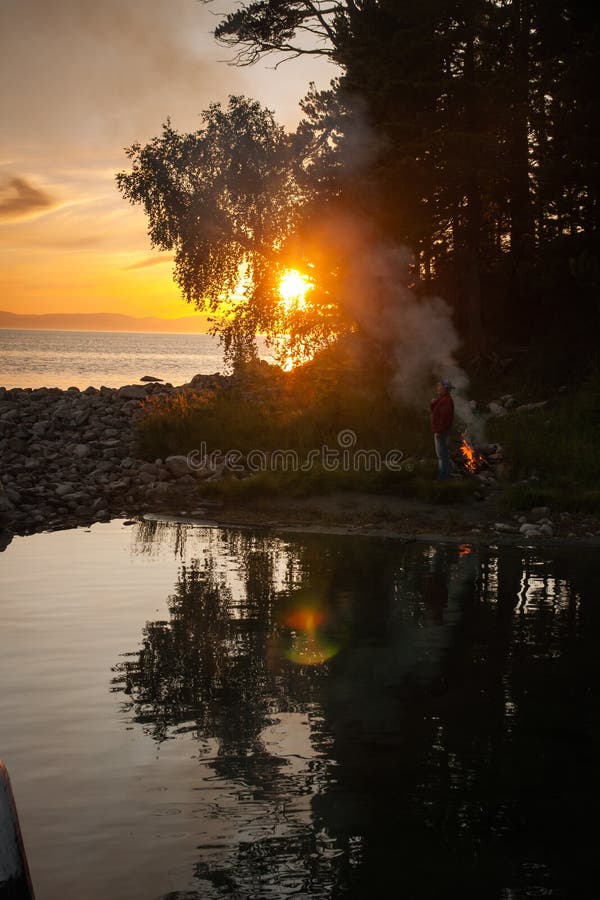 Bonfire on the Shore of the Lake Stock Image - Image of lake, summer ...