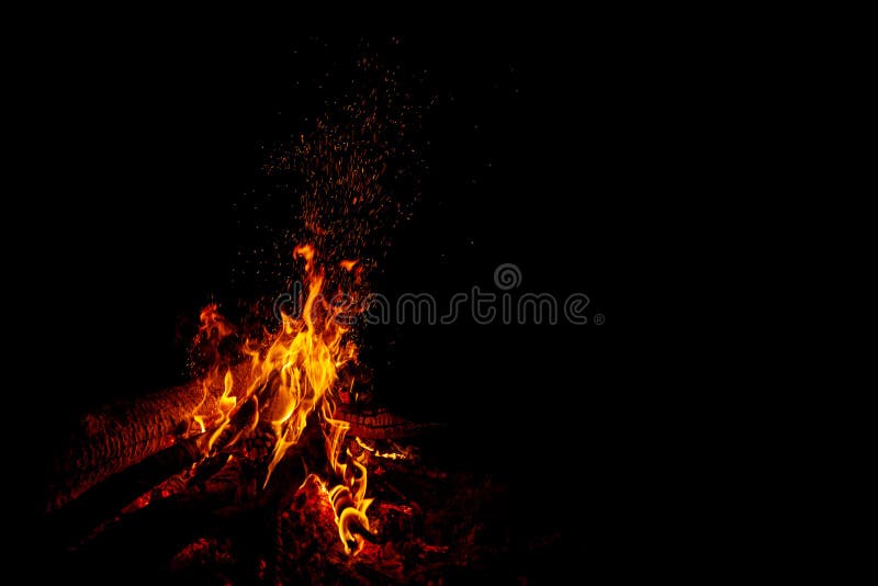 Bonfire with Sparks on a Black Background Stock Photo - Image of ...