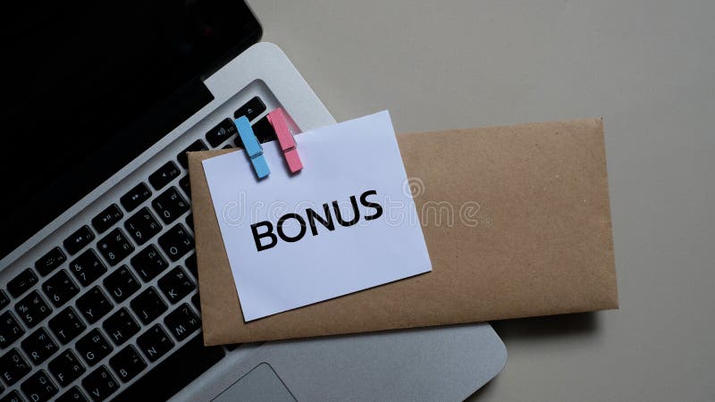 Bonus Message Concept Written Post it on Laptop Keyboard. Stock Image ...