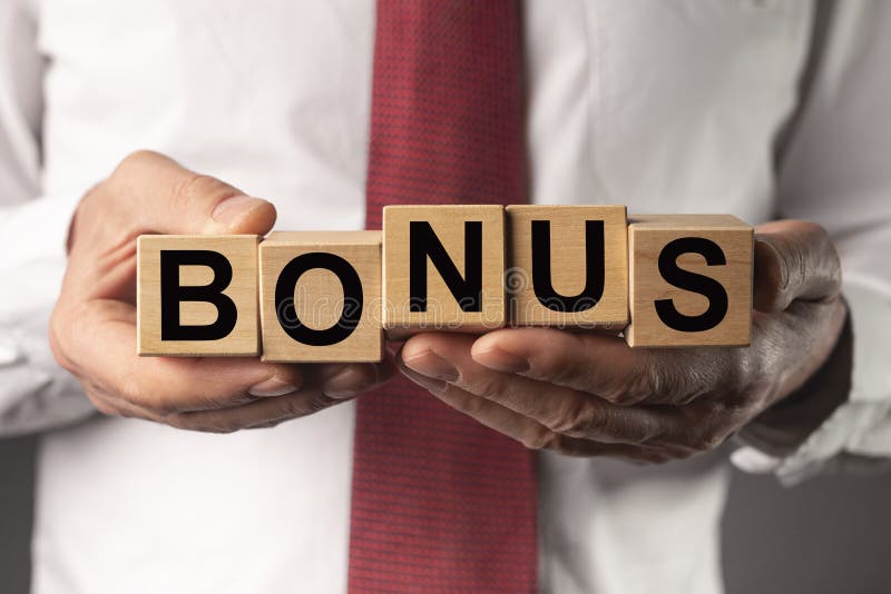 Bonus Word on Cubes in Male Hands Stock Image - Image of profit ...
