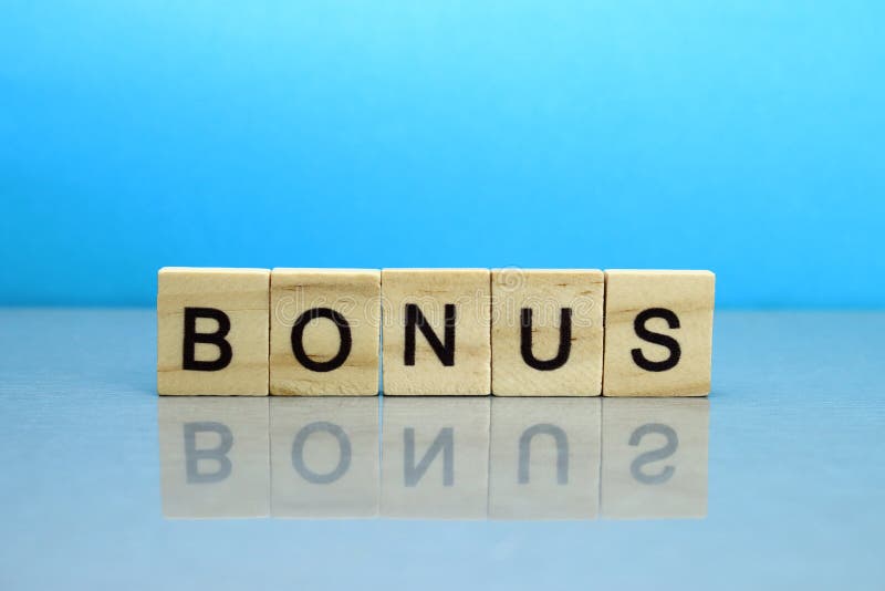 Bonus Word Made of Wooden Blocks on a Blue Background Stock Photo ...