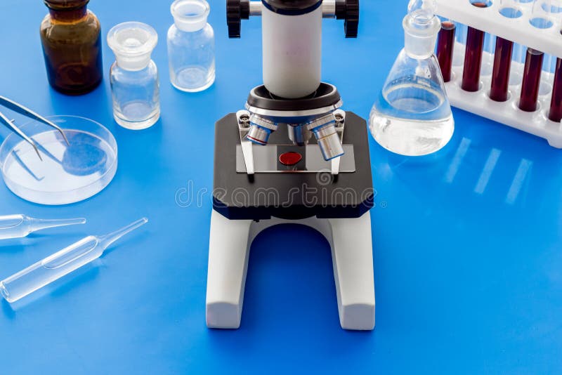 Bood Testing with Microscope in Laboratory. Equipment on White ...