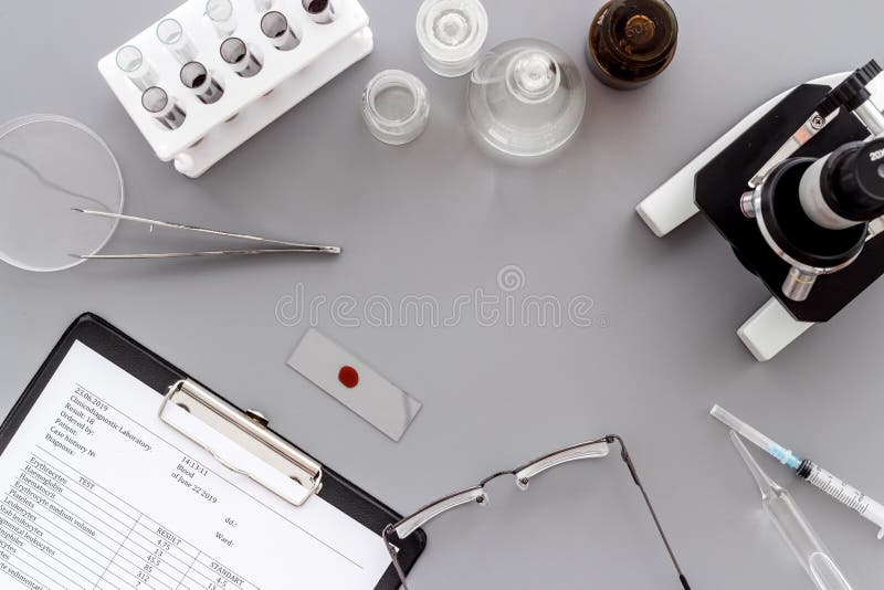 Bood Testing with Microscope in Laboratory. Equipment on White ...