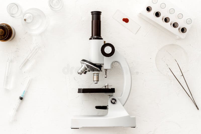 Bood Testing with Microscope in Laboratory. Equipment on White ...