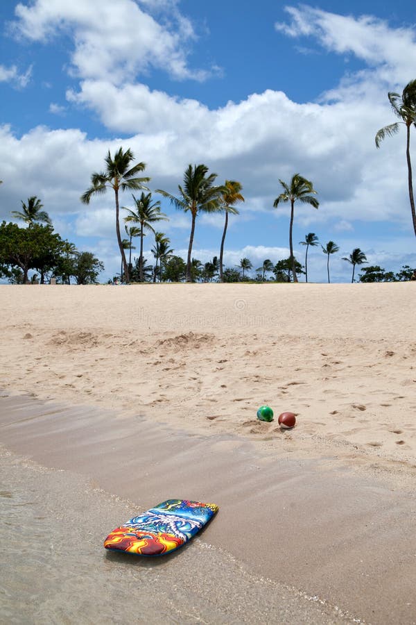 Boogie Board and Beach Balls on a Tropical Beach Stock Photo - Image of ...