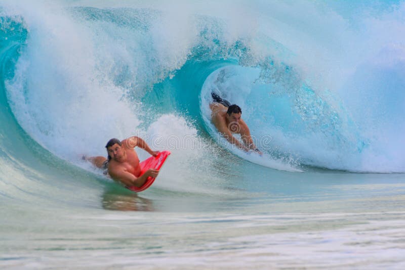 Boogie Boarder in the Pipe As the Wave Breaks Over Him. Sandy Be ...