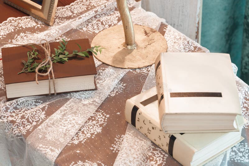 Book Adorned with Green Leaves on the Table Stock Photo - Image of ...