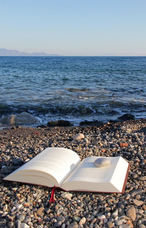 Book at beach stock image. Image of coast, bestseller - 22716721