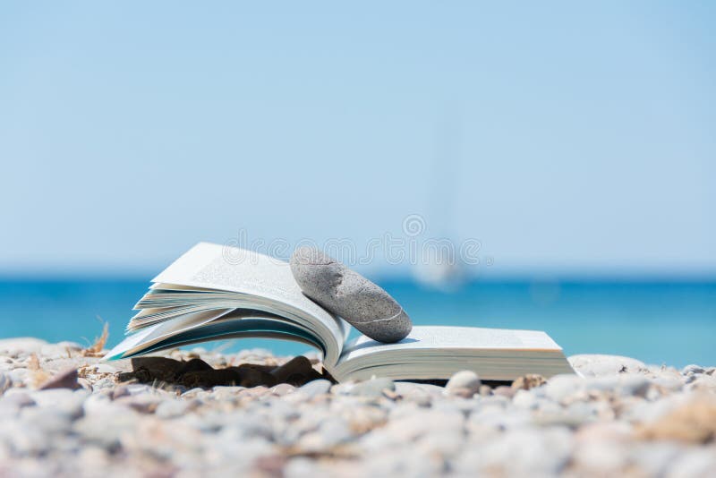 Book on the beach stock photo. Image of white, outside - 60242984
