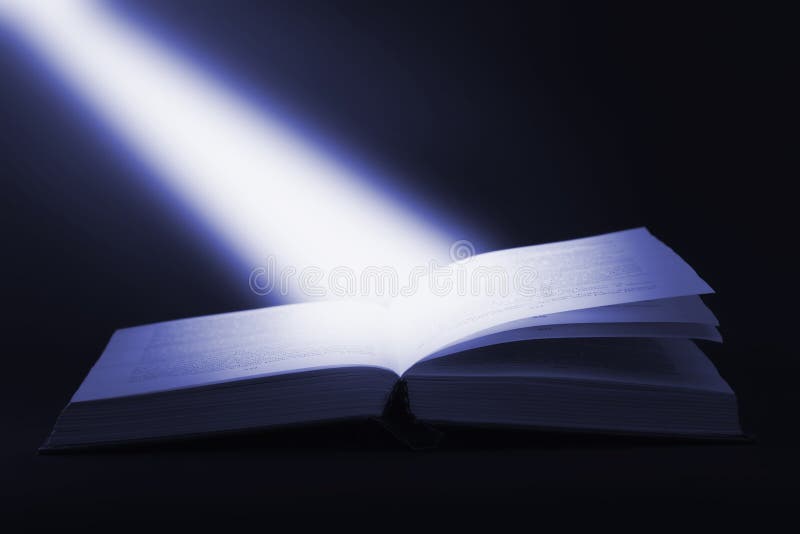 Ray of Light Shining from a Book Stock Photo - Image of open, highlight ...