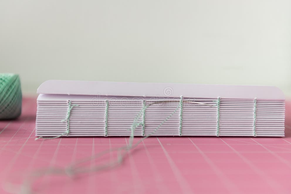 Book Binding Process. Threads, Scissors and Pages. Handmade Coptic ...