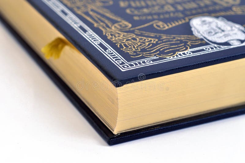 A Book with a Black Cover and Edge Gilding Stock Photo - Image of ...