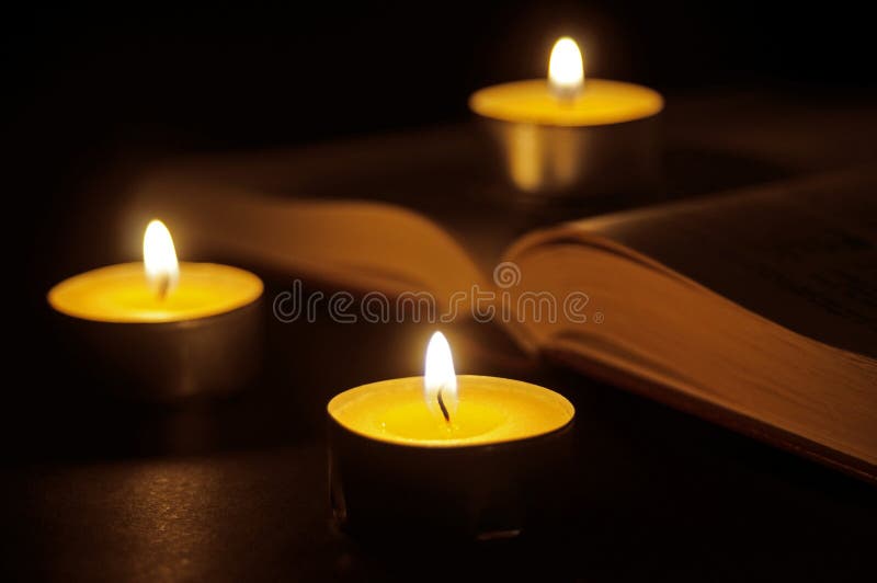 Book and candles stock image. Image of dark, black, still - 35483021