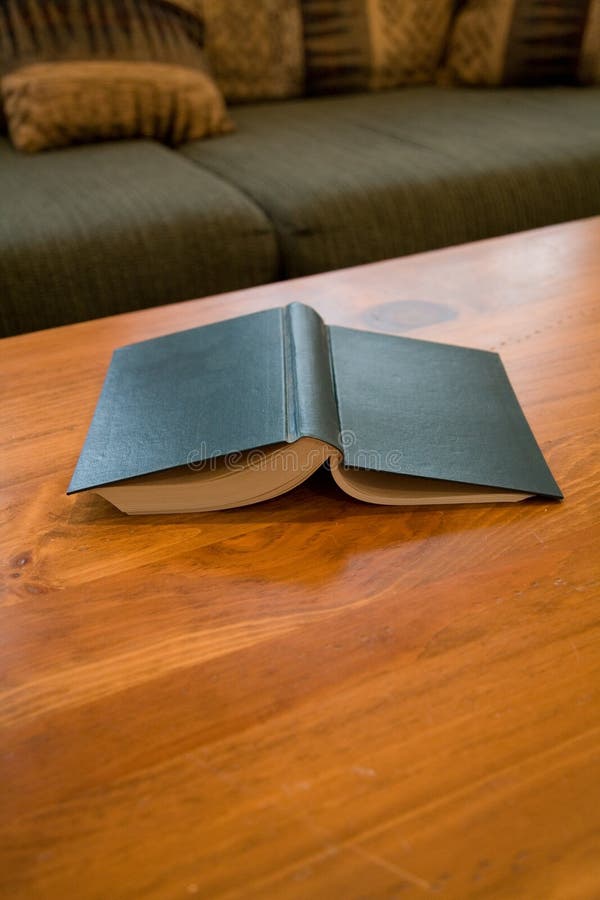 Book and coffee table stock image. Image of book, home - 4899559