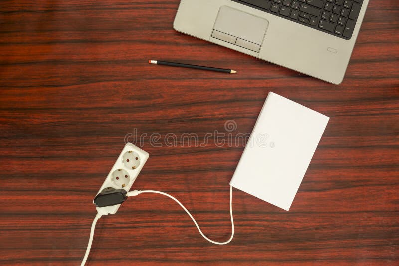 Book Connected To a Power Outlet. Stock Photo - Image of connector ...