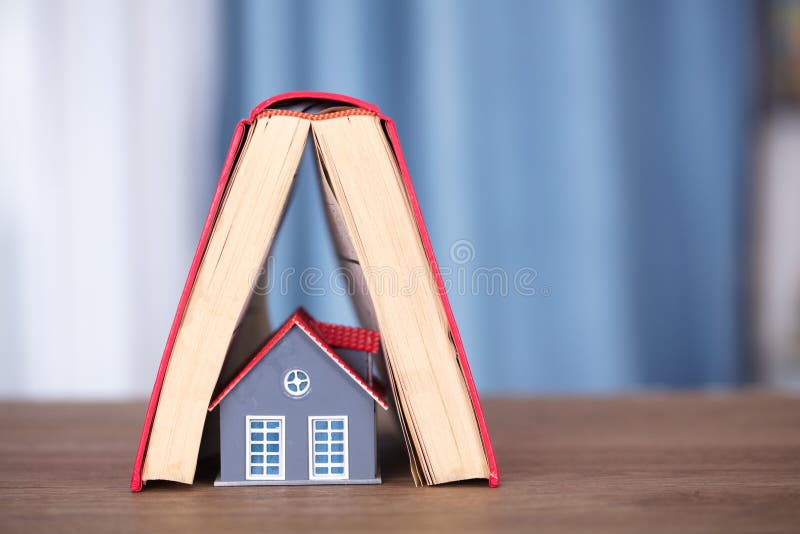 A Book Covers a Small House Model Stock Image - Image of life ...