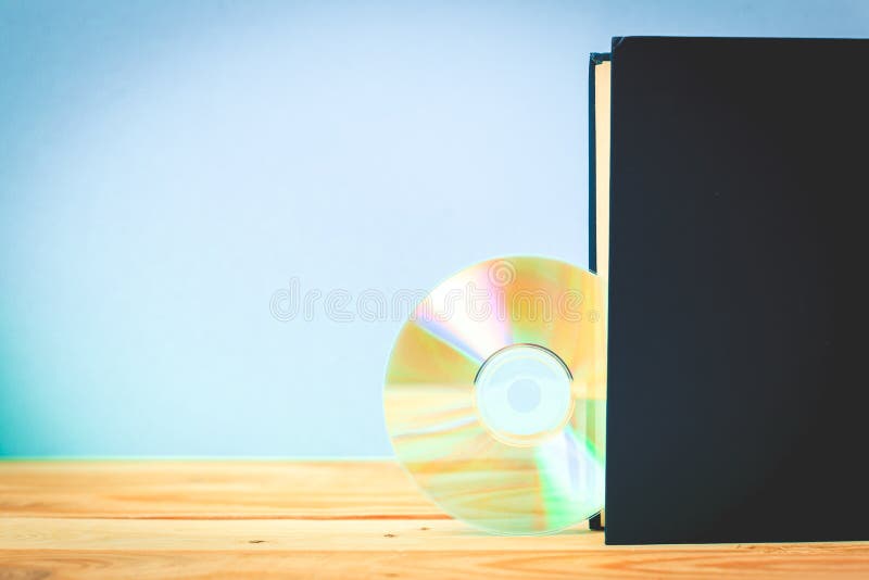 Book and DVD disk stock photo. Image of recordable, density - 70230954