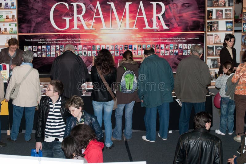 Visitors Viewing Books at a Publishing House Editorial Image - Image of ...