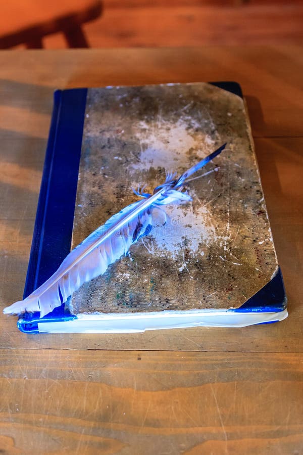 A Book with a Feather on Top of it Stock Image - Image of page, empty ...