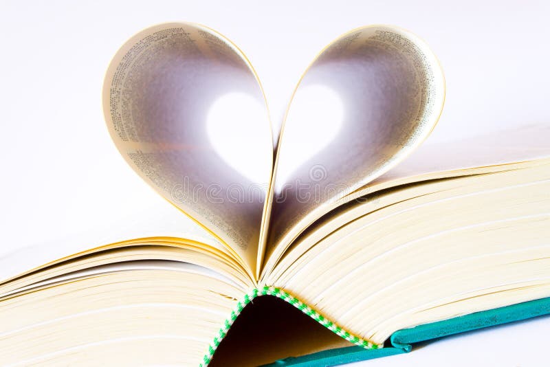 Open Book on Wooden Table on Natural Blurred Background. Heart Book ...