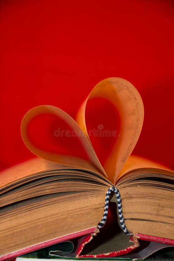 Book with heart shaped stock photo. Image of education - 36711022