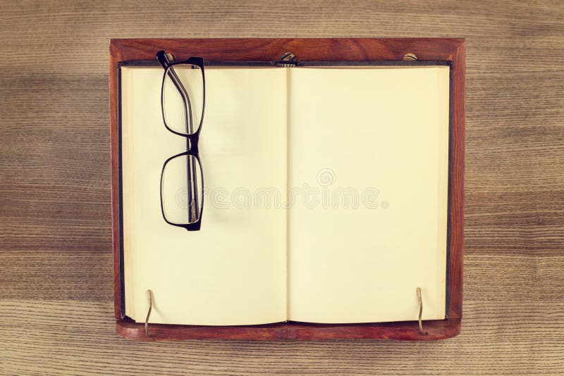 Book on a lectern stock image. Image of pile, glasses - 105244031