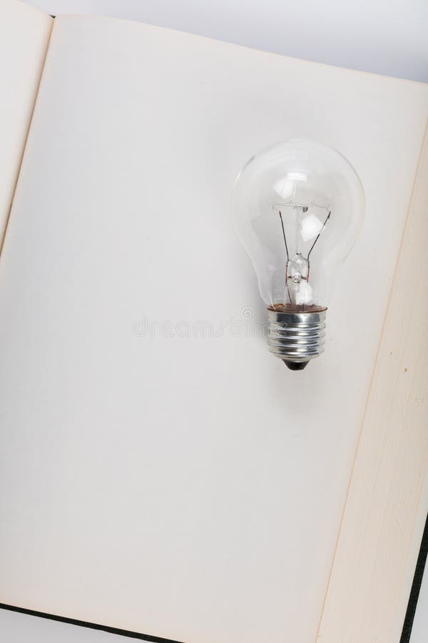 Book and light bulb stock photo. Image of open, electric - 135385030