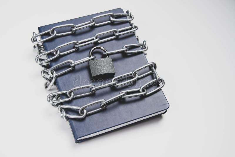 The Book is Locked Under Lock and Key on a White Background. Secret ...