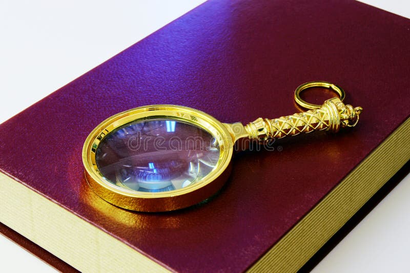 Book and magnifying glass stock image. Image of white - 18373469