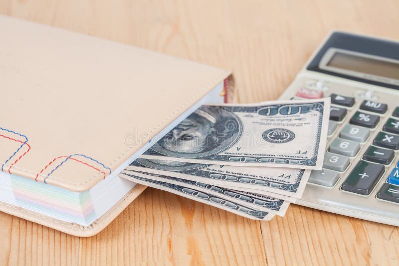 Book with Money on Wood Table Stock Photo - Image of book, education ...