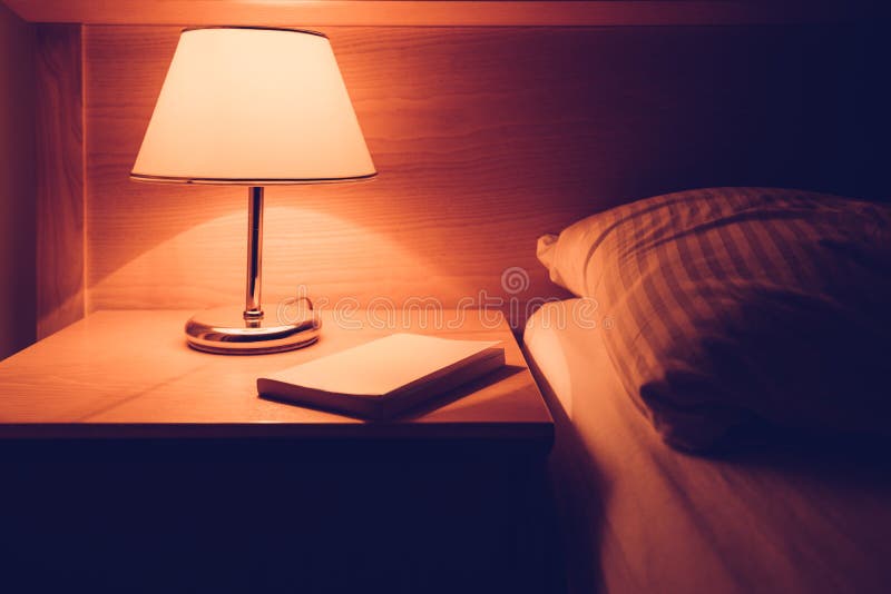 Night table and books stock photo. Image of night, manual - 68412720