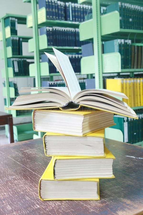 Book open on books stack stock image. Image of information - 35085847