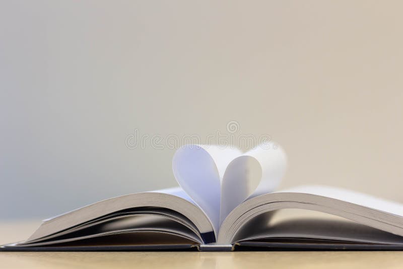 Book page in heart shape stock photo. Image of education - 159896252