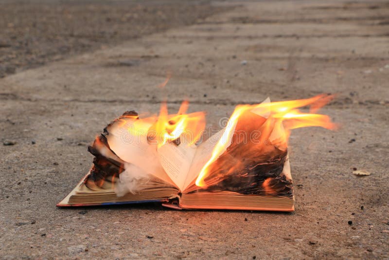 Book with Burning Pages on a Concrete Surface Stock Image - Image of ...