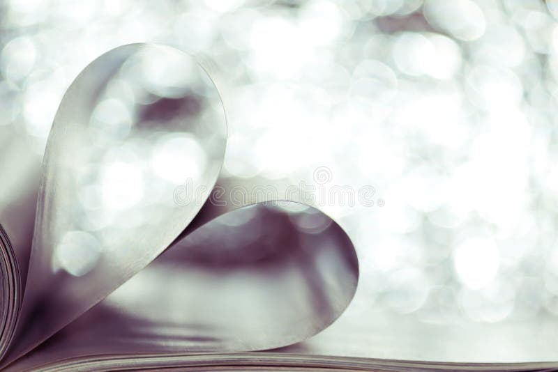 Book with Pages Folded into a Heart Shape Stock Photo - Image of school ...