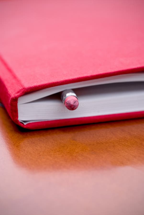 Book with pencil inside stock photo. Image of eraser, almanac - 6920658