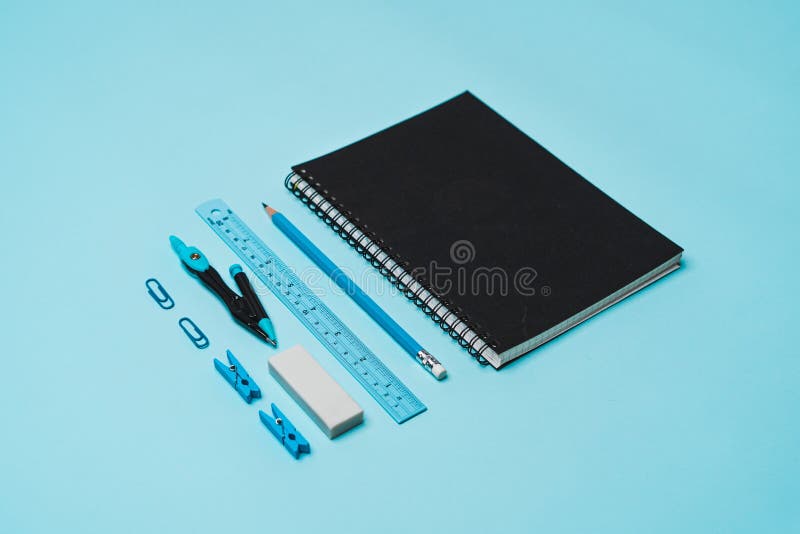 Book, Pencil, Ruler on a Blue Background Stock Image - Image of office ...
