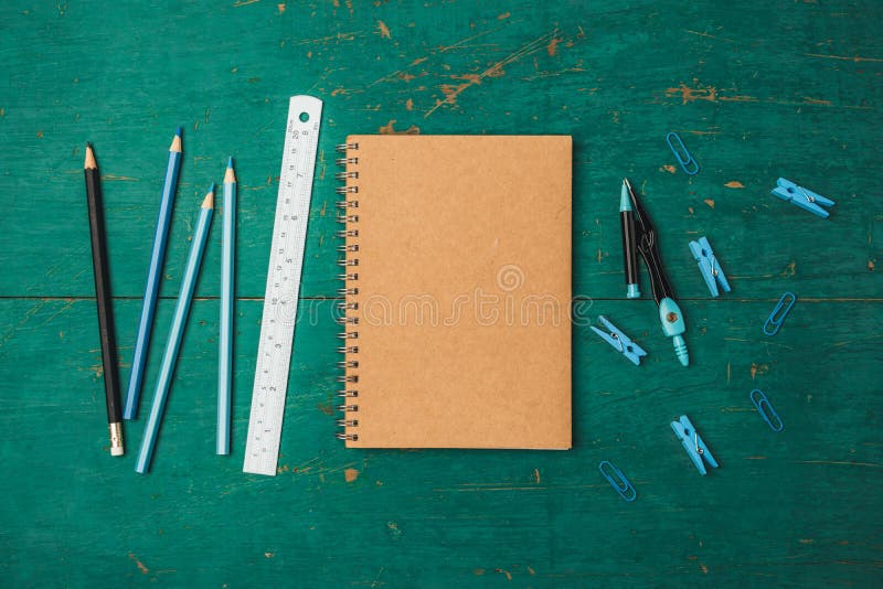 Book, Pencil, Ruler on the Green Wood Study Table Stock Image - Image ...