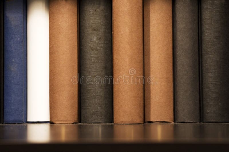 Book on shelf in library stock photo. Image of hardcover - 20637902