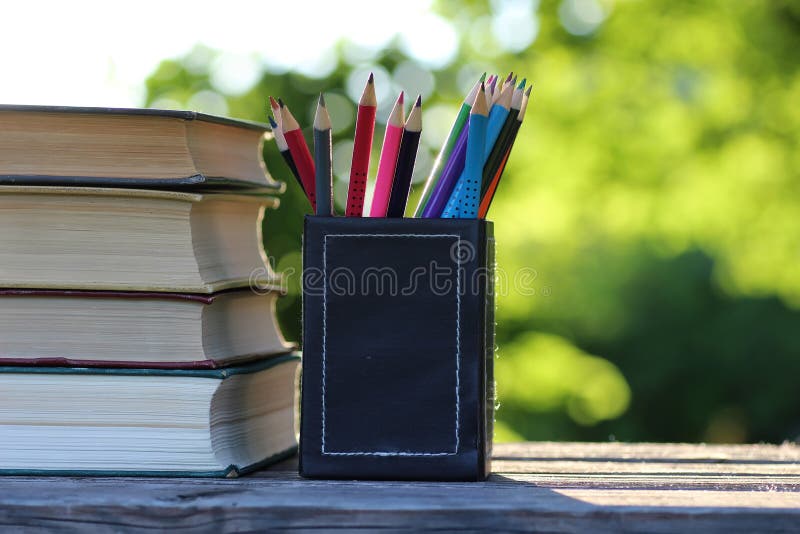 Book Stack Background Table Wooden Outdoor Stock Photo - Image of bokeh ...