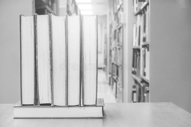 Book Stack in the Library Room and Blurred Bookshelf for Business and ...